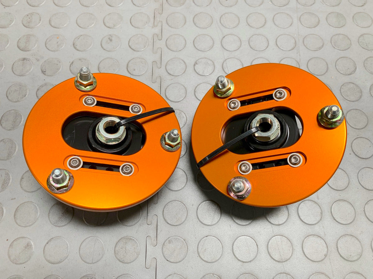 AST Mitsubishi EVO X Front Top Mounts – Mann Engineering